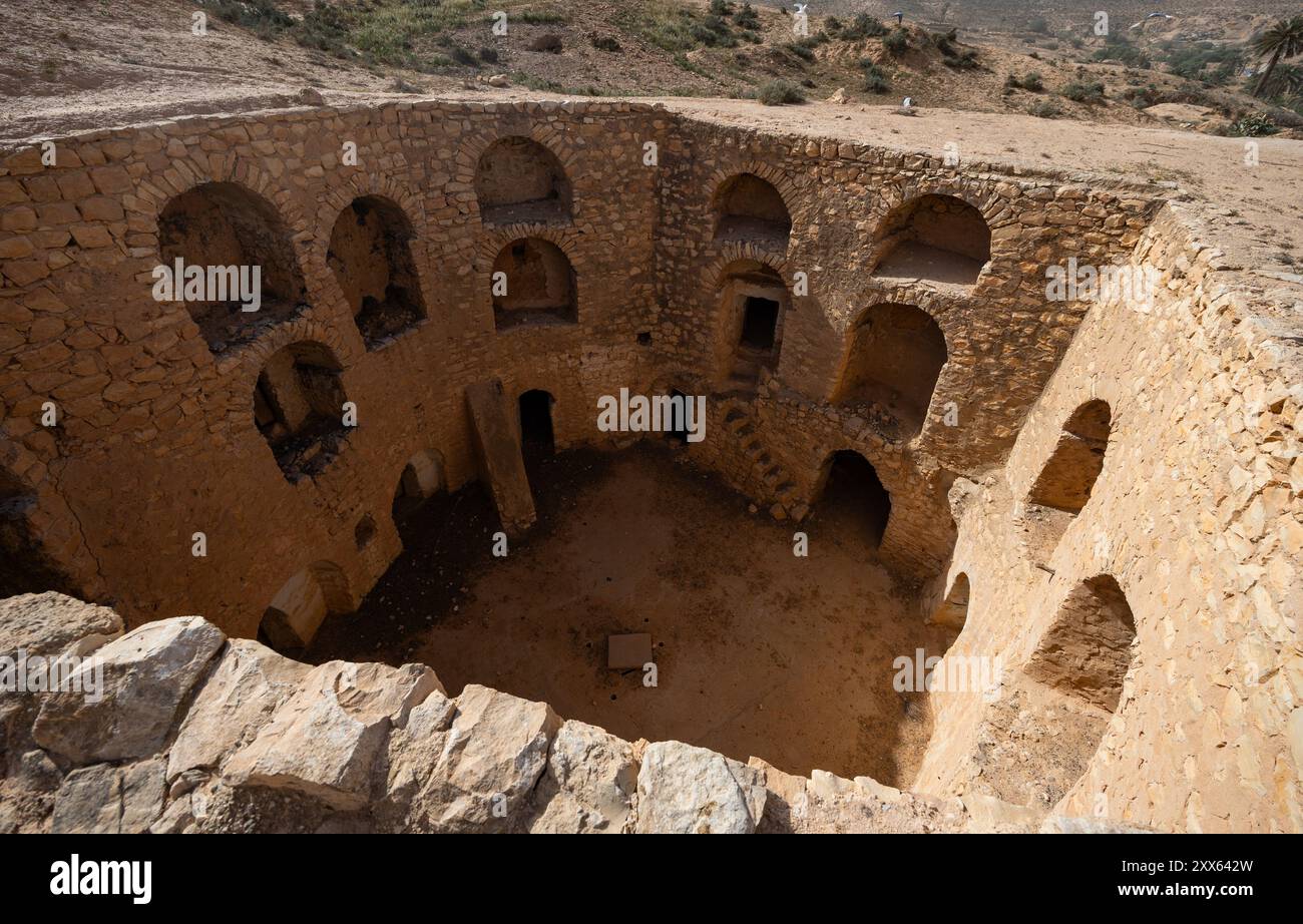 Preserved cave dwellings into walls of earthen pit in Matmata Stock ...