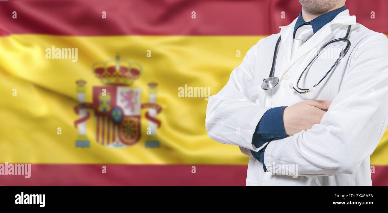 Male doctor with stethoscope on Spanish flag isolated. Spanish Health ...