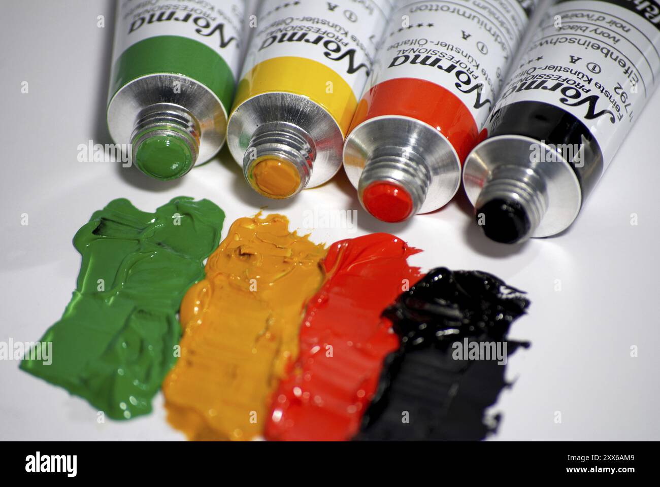 Four paint tubes, artist colours, green, yellow, red, black Stock Photo ...