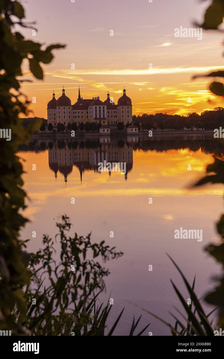 The moated castle, also known as a film set, lies in the middle of a ...