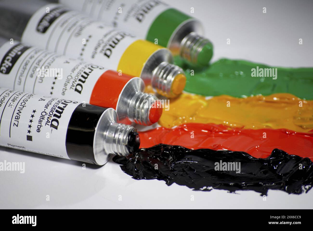 Four paint tubes, artist colours, green, yellow, red, black Stock Photo ...