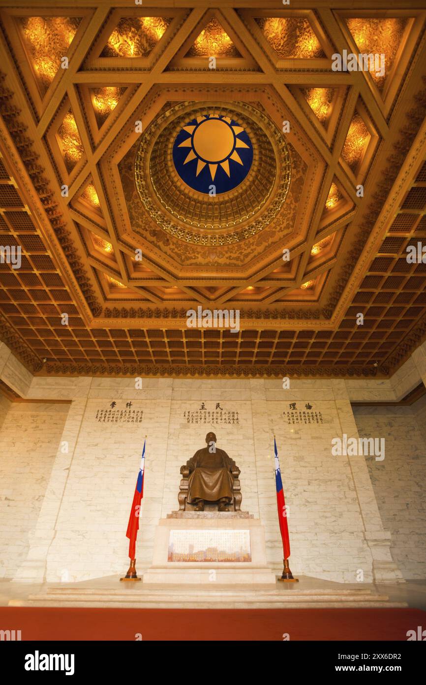A beautifully ornate ceiling and a statue of Chiang Kai Shek inside the ...