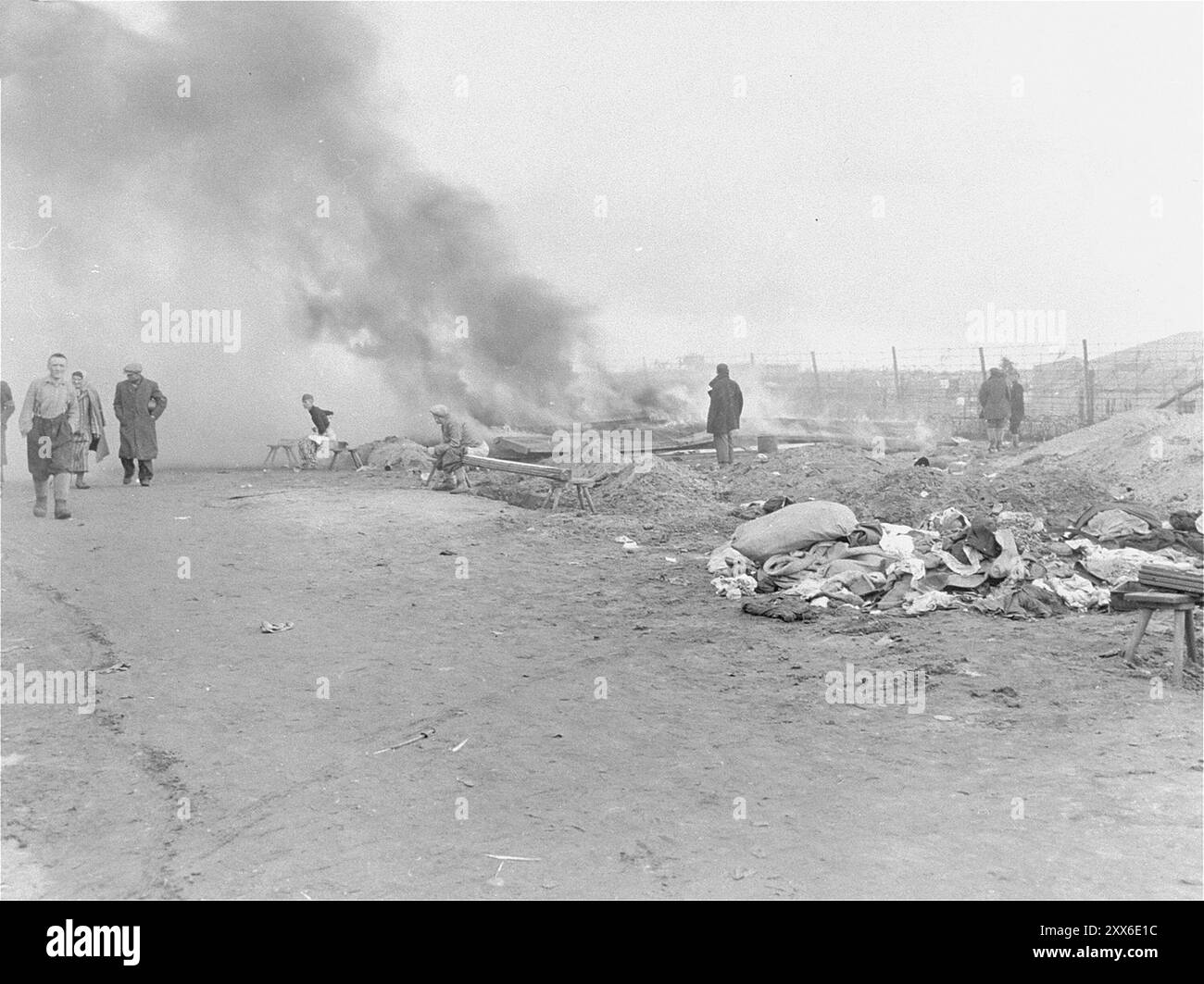 Part of the Bergen-Belsen concentration camp burning after it was set ...
