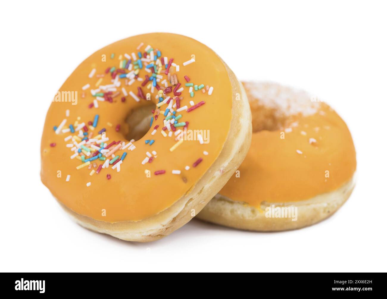 Some fresh made Donuts isolated on white background (close-up shot ...