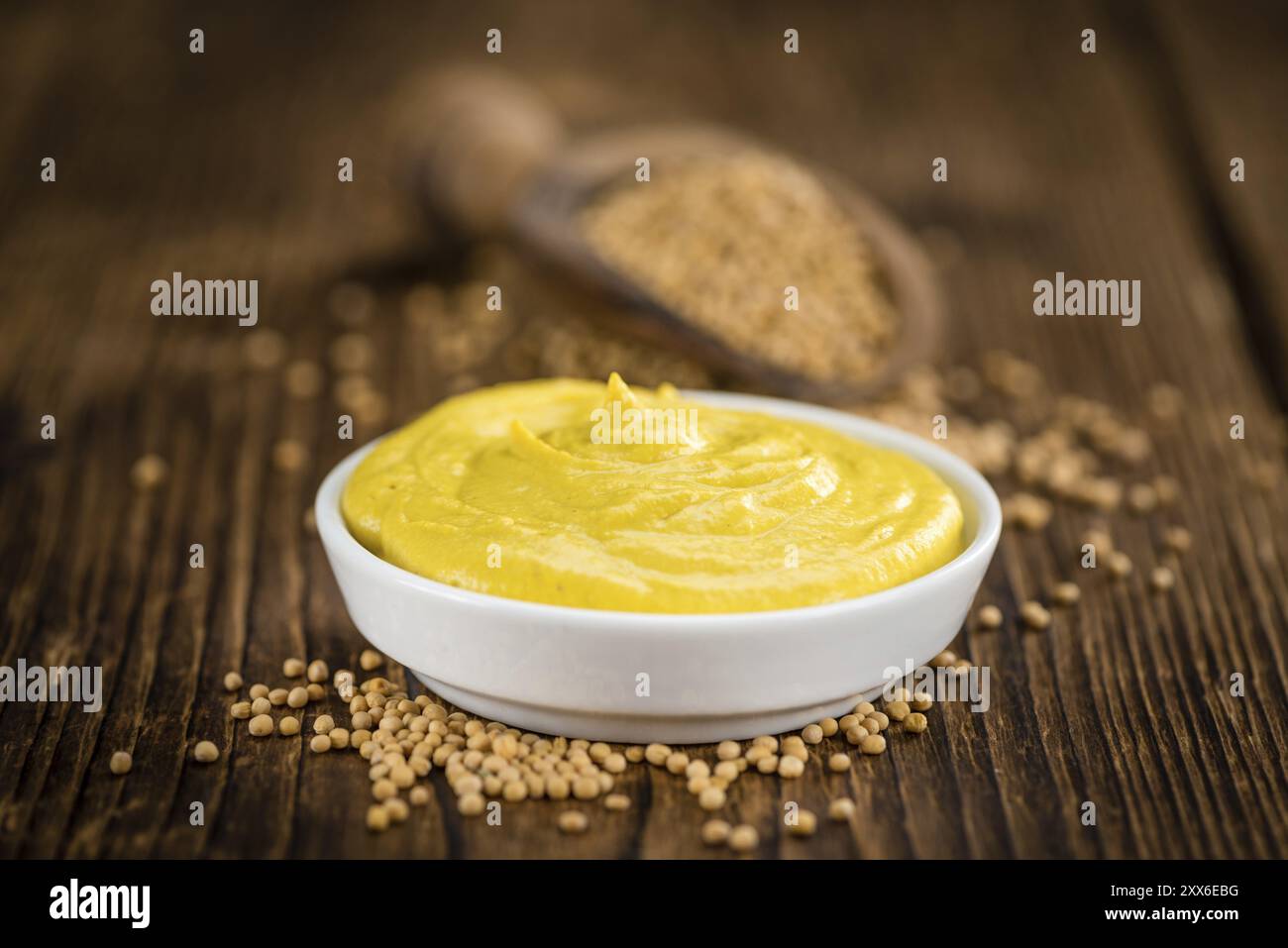 Mustard on a vintage background as detailed close-up shot (selective ...