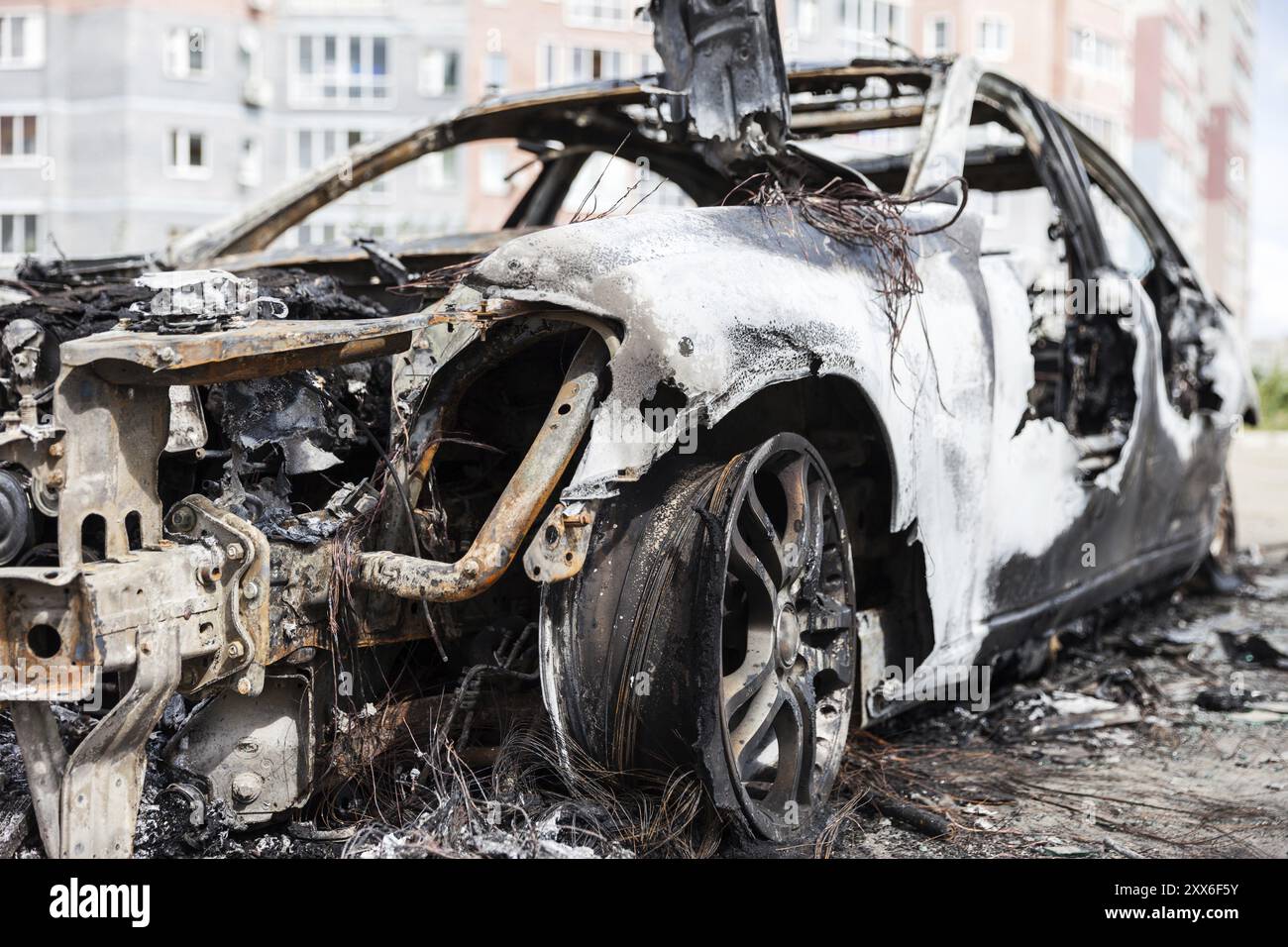 Road wreck accident or arson fire burnt wheel car vehicle junk Stock ...