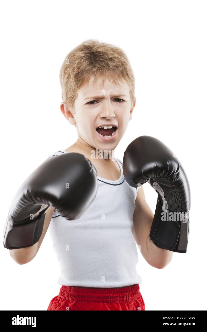 Smiling boxer child boy in boxing gloves training martial art sport ...