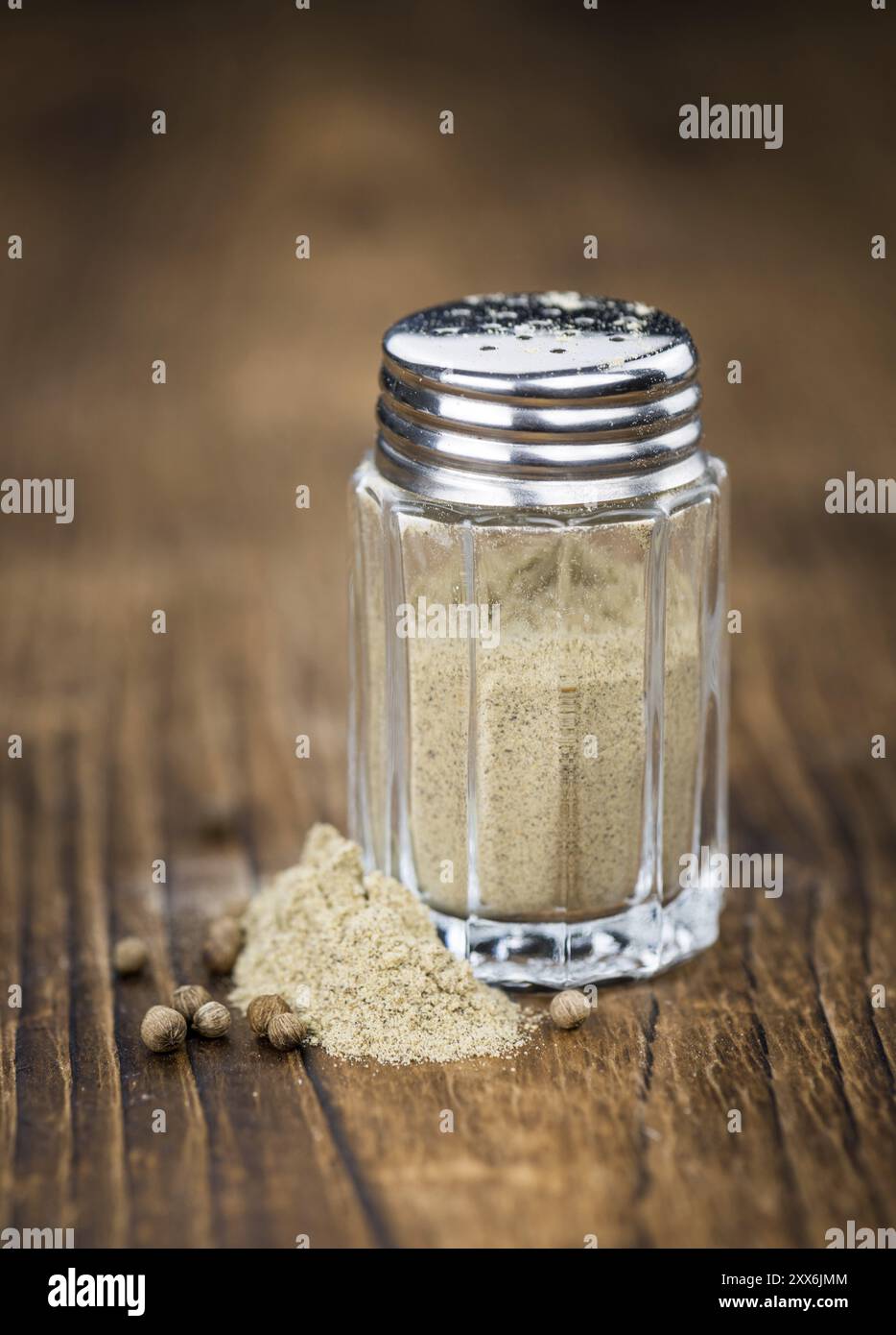 Fresh made White Pepper on a vintage background as detailed close-up ...