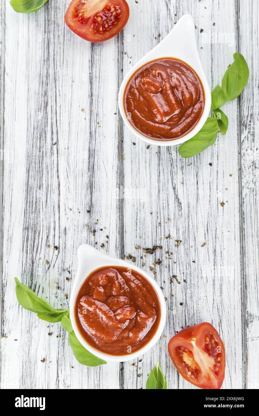 Portion of fresh made Tomato Ketchup (close-up shot, selective focus ...