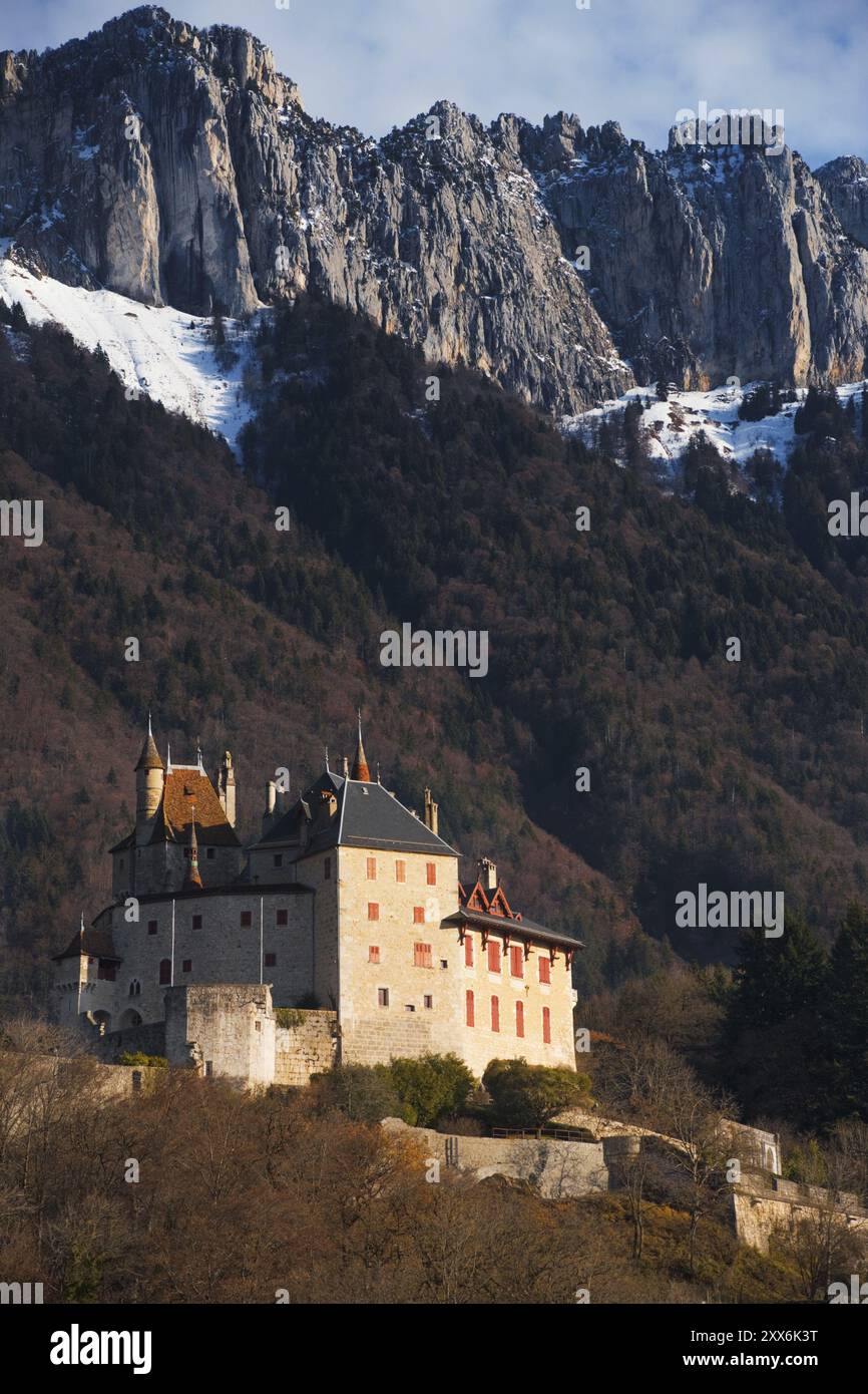 The picturesque fairy tale, Menthon-Saint-Bernard castle at the base of ...