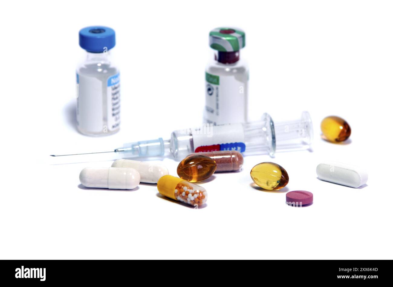 Syringe and medicine bottles as symbol of doping Stock Photo - Alamy