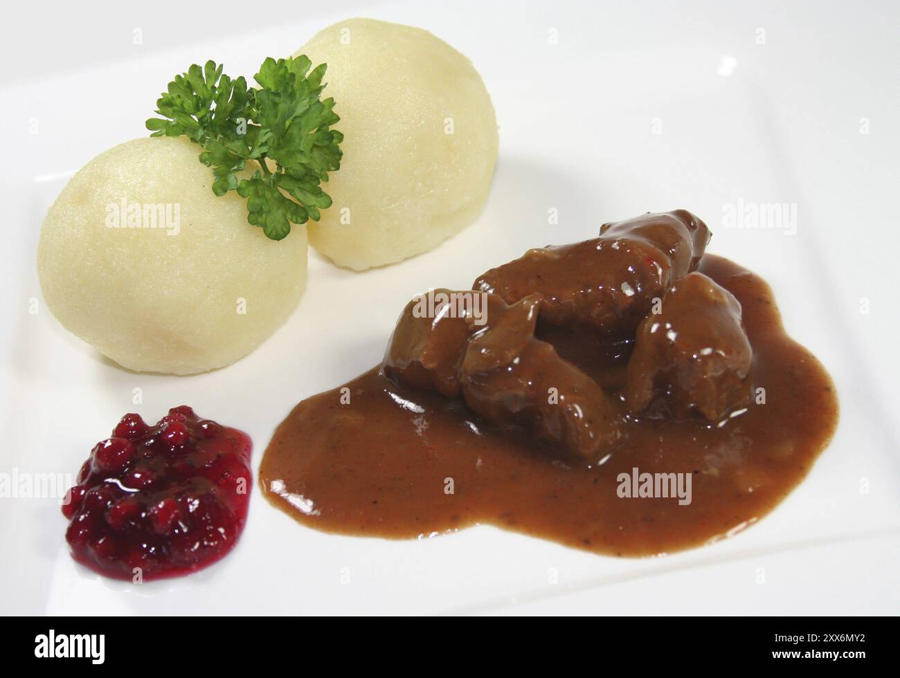 Game goulash with dumplings Stock Photo - Alamy