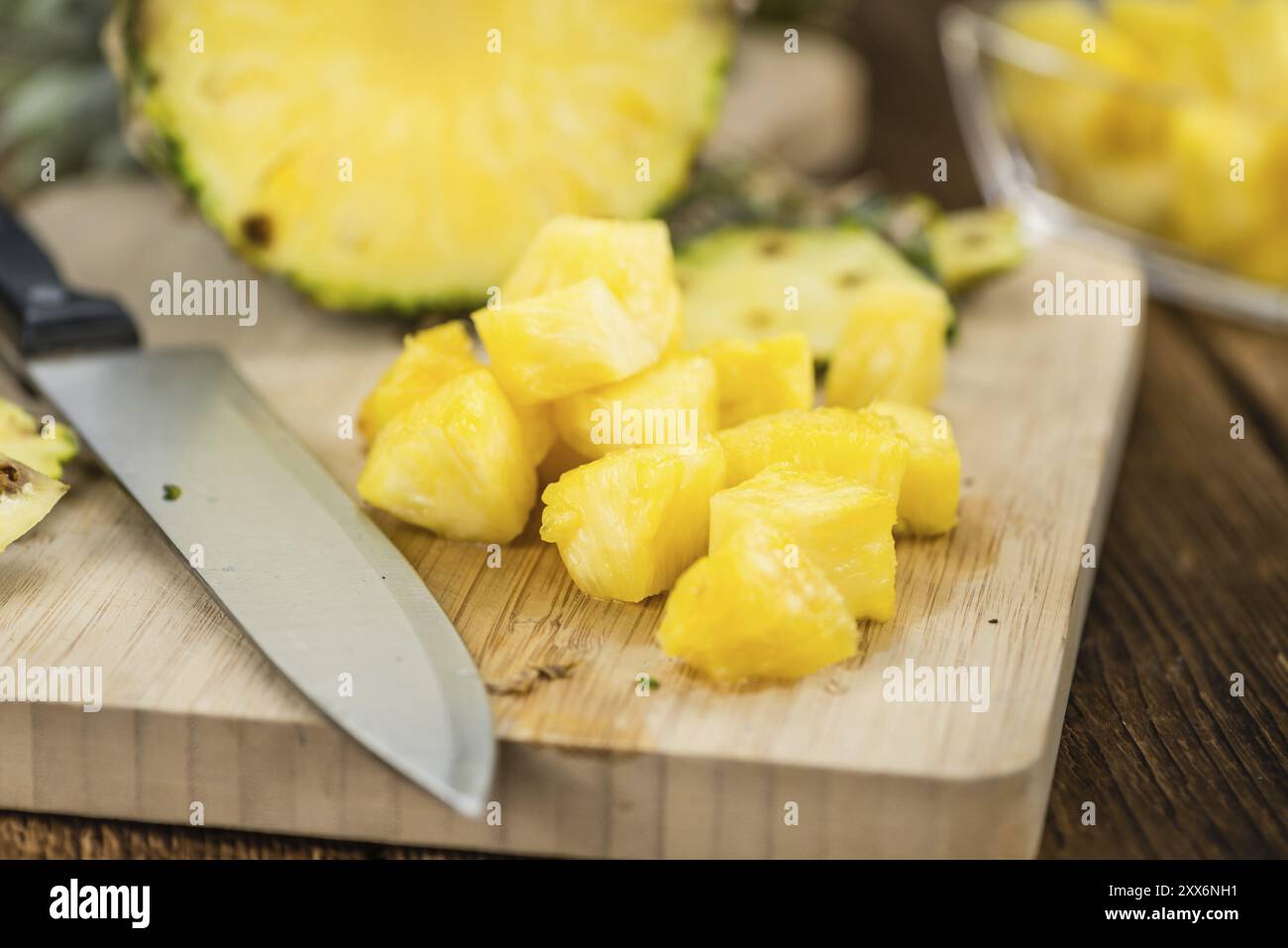 Fresh made Pineapple (sliced) on a vintage background as detailed close ...
