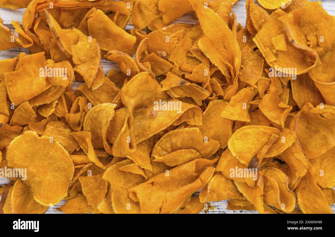 Sweet Potato Chips on a vintage background as detailed close-up shot ...