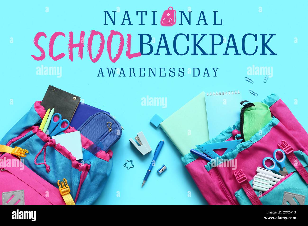 Schoolbags and stationery on light blue background. National School ...