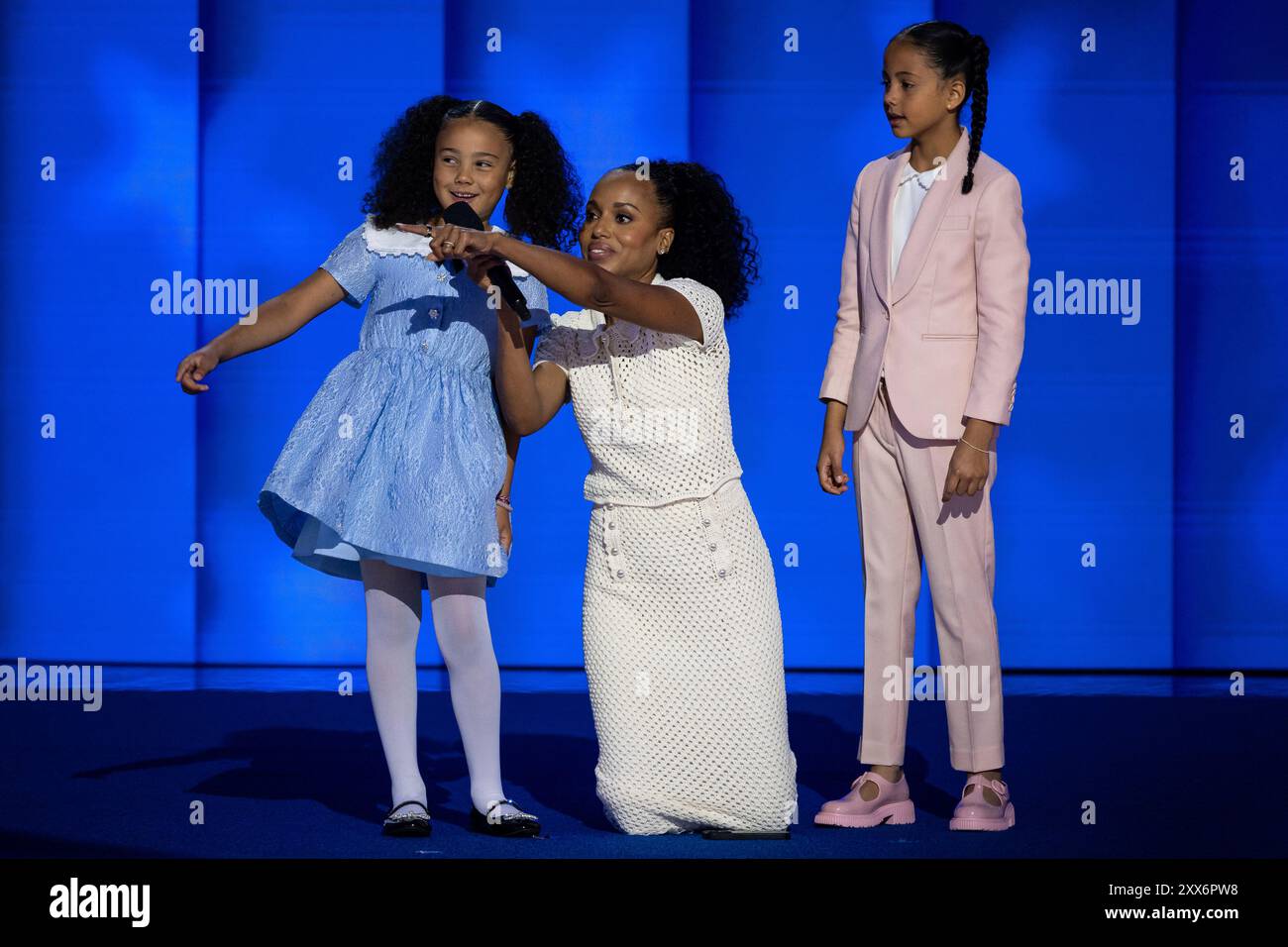 Actress Kerry Washington, center, is joined on stage by Kamala Harris ...