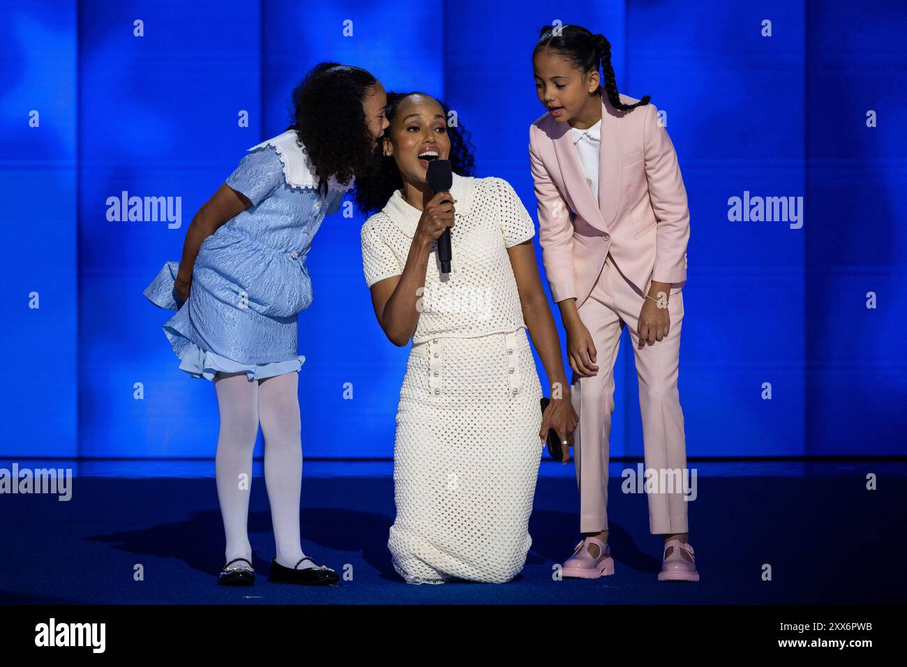 Actress Kerry Washington, center, is joined on stage by Kamala Harris ...