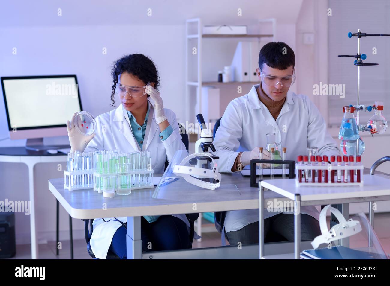Professional chemists working in lab hi-res stock photography and ...