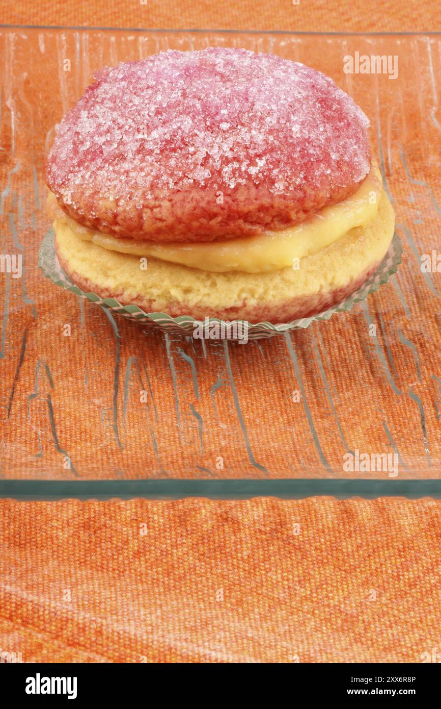 Italian custard pastries with alchermes and sugar on a transparent ...