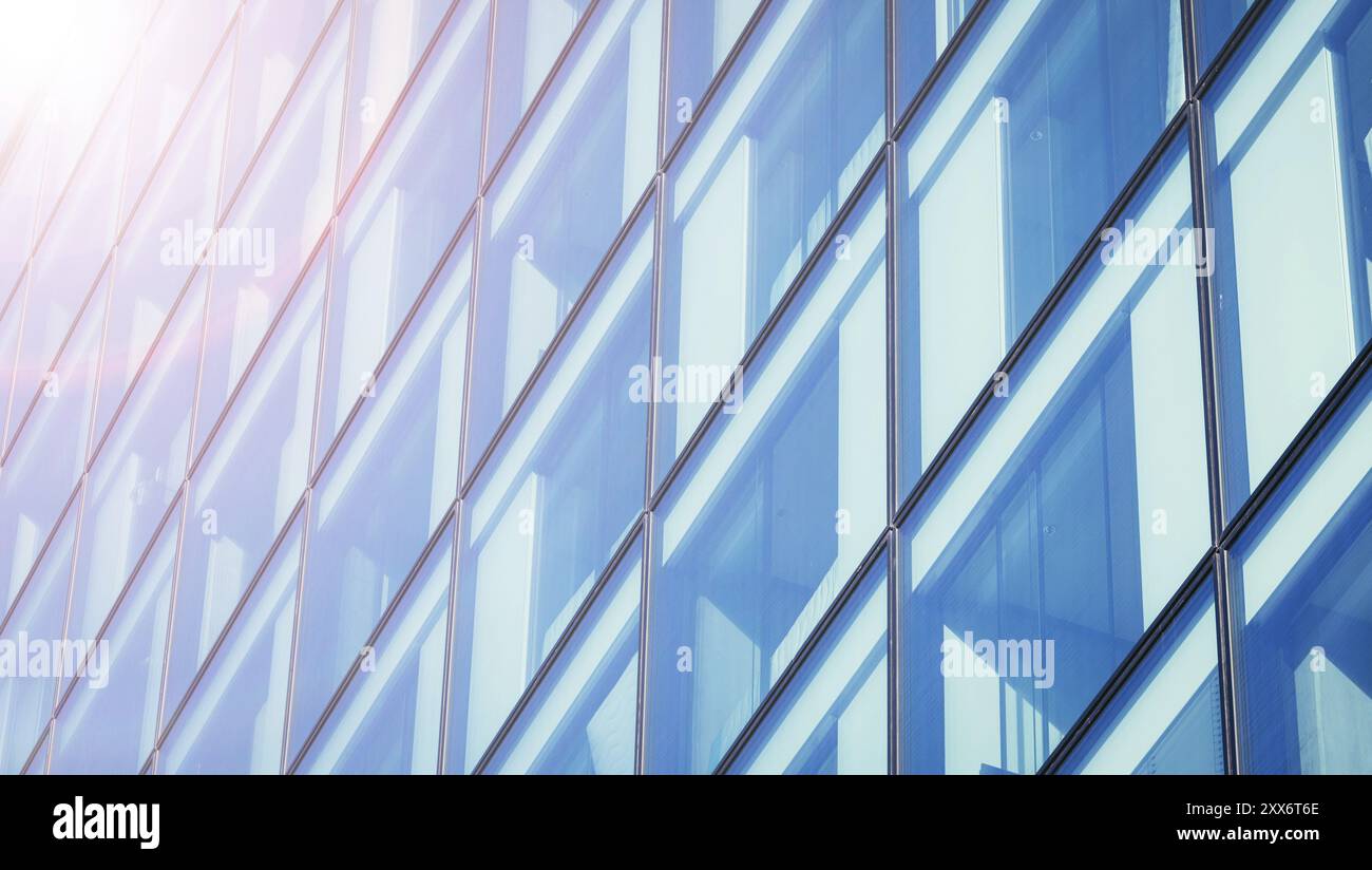 Modern office building: Skyscraper with blue glass Stock Photo - Alamy