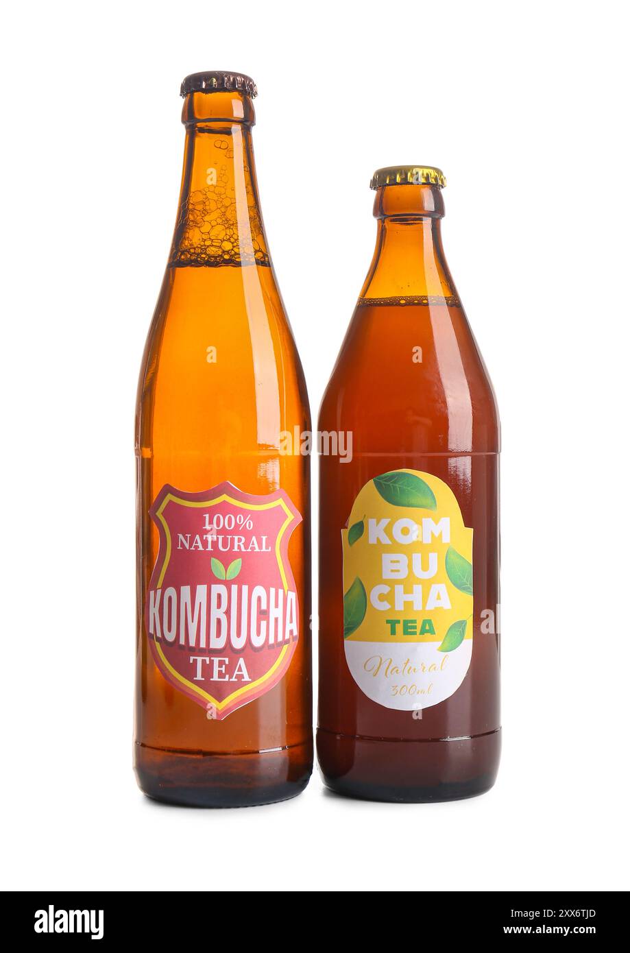 Bottles of tasty kombucha tea on white background Stock Photo - Alamy