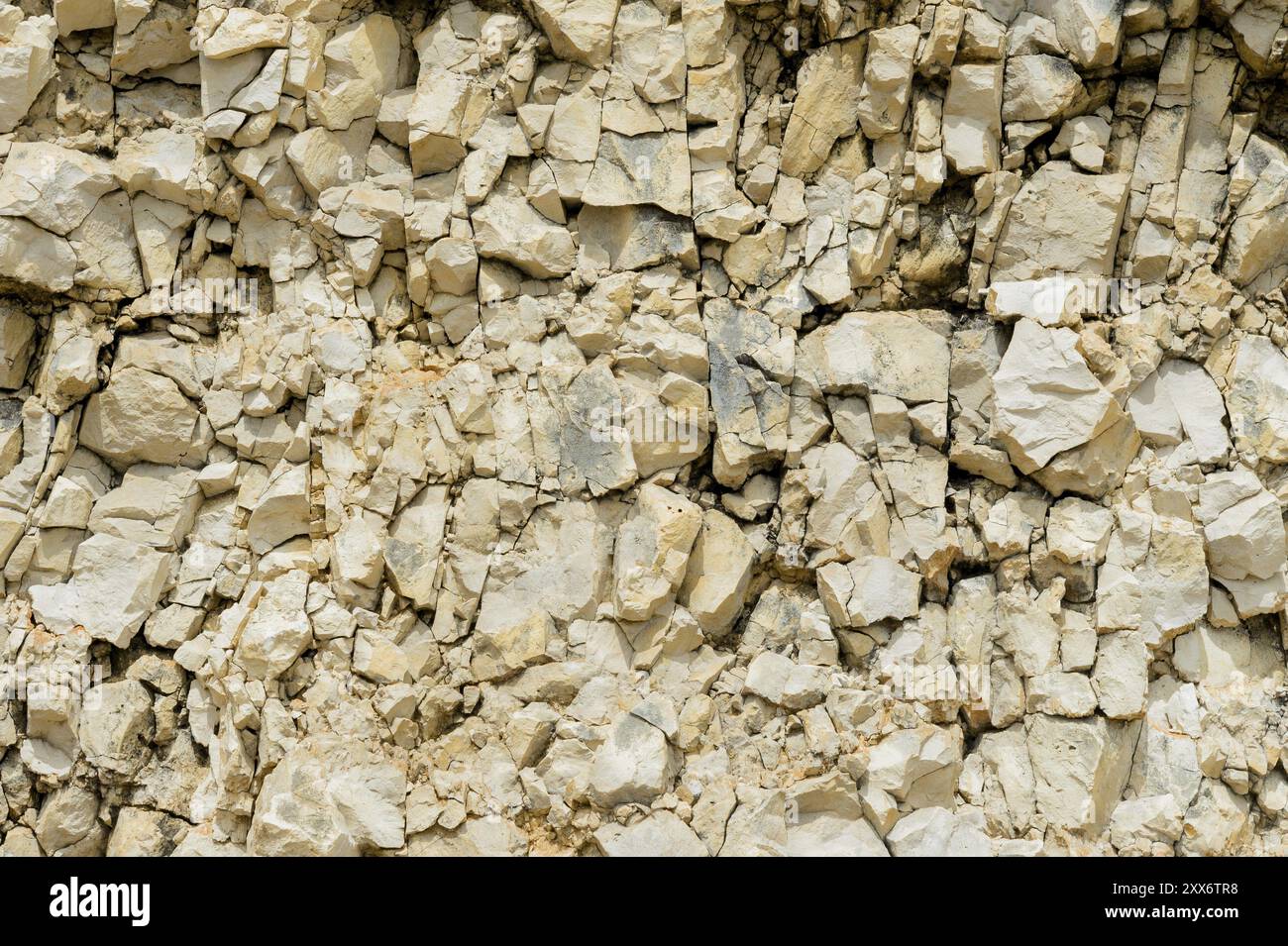 Textured stone background Rubble ballast in natural form in the rock ...