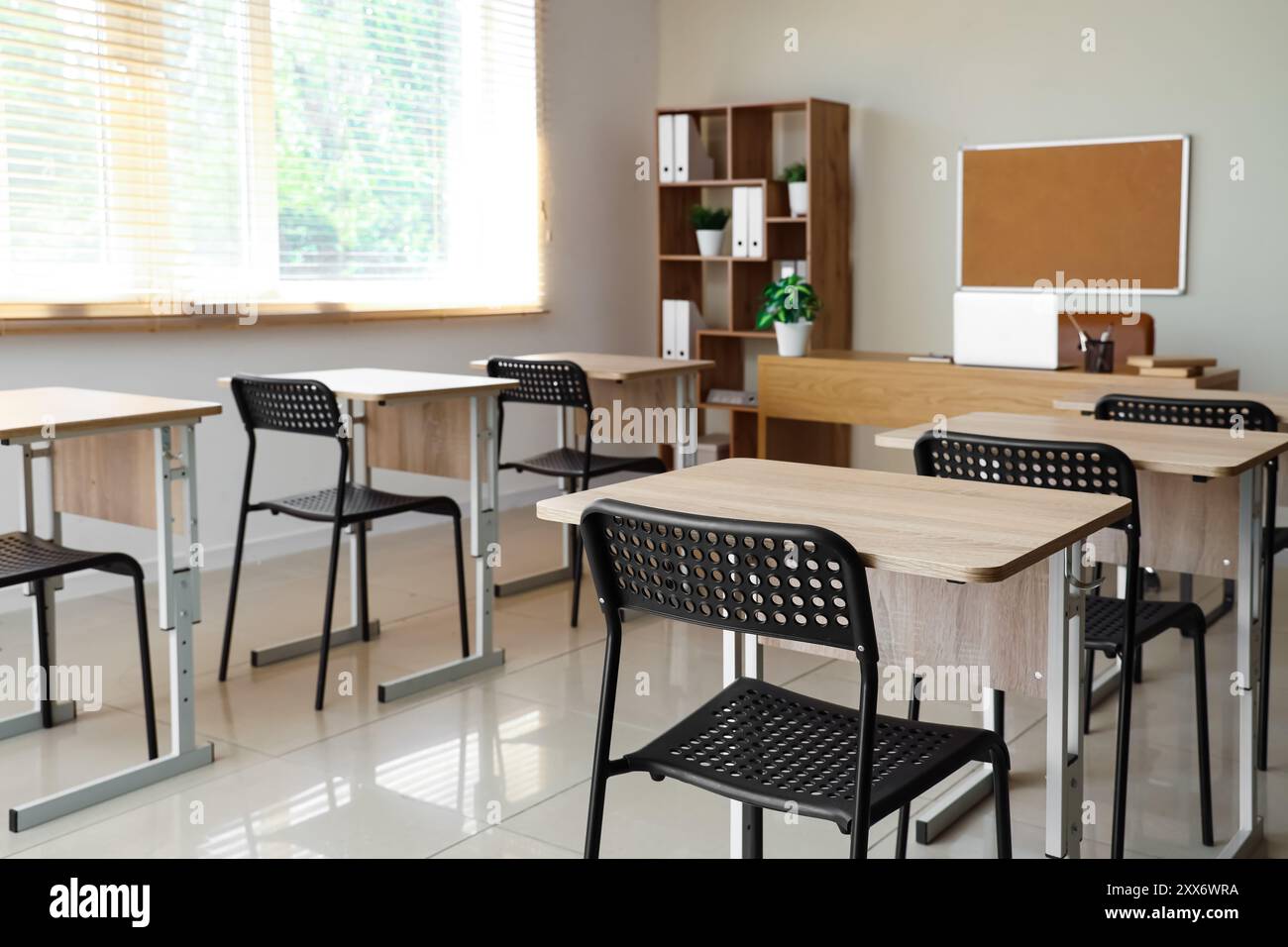 Interior of empty classroom with desks and chairs at school Stock Photo ...