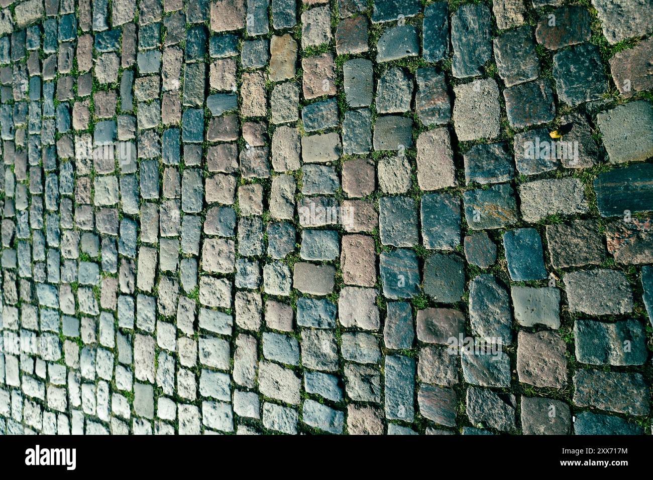 Background of bricks road. Background with bricks road. Stone cladding ...