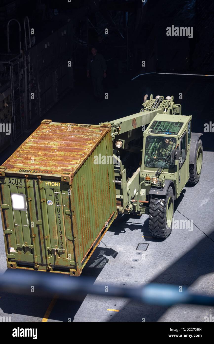 U.S. Marine Corps Cpl. Quinn Kelly, a heavy equipment operator with the ...