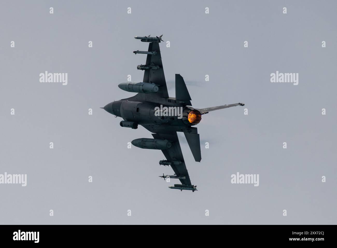 A U.S. Air Force F-16 from the 93rd Fighter Squadron flies above ...