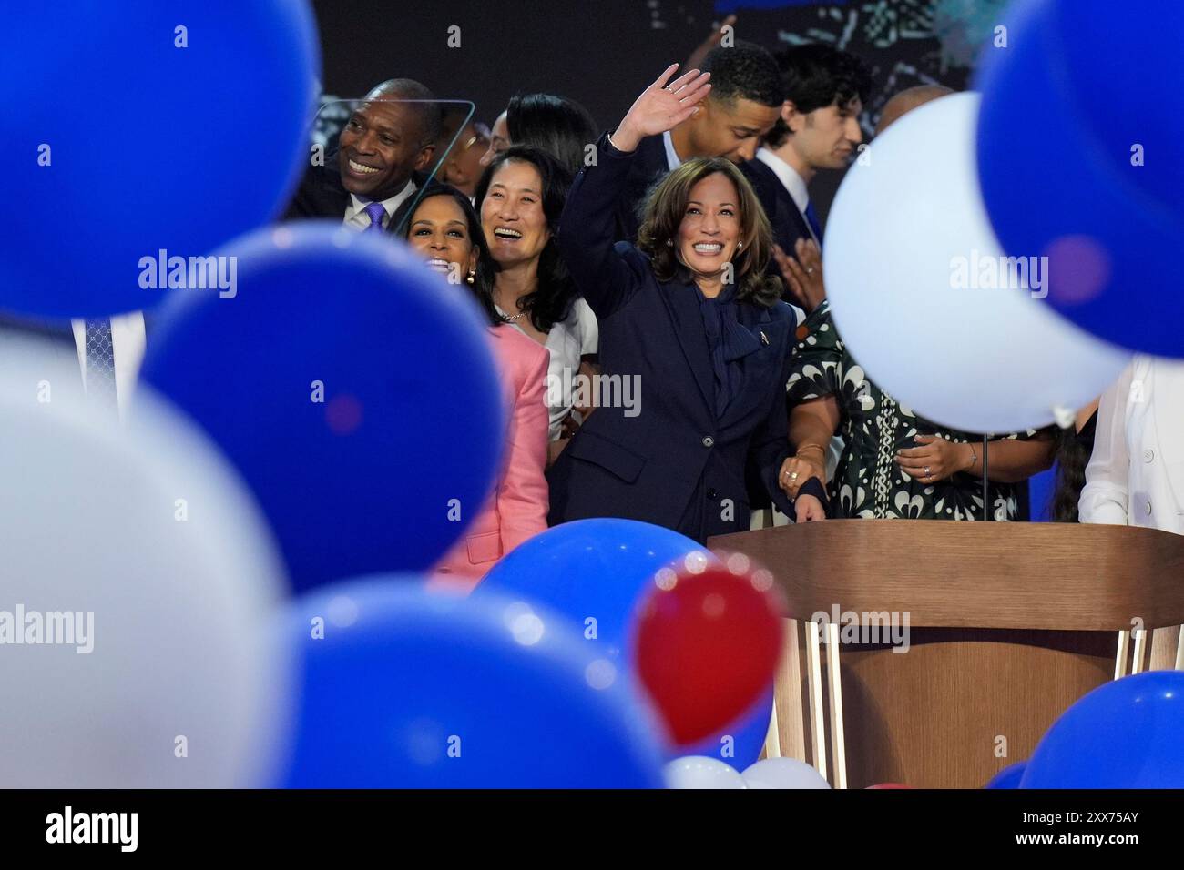 Democratic presidential nominee Vice President Kamala Harris, center ...