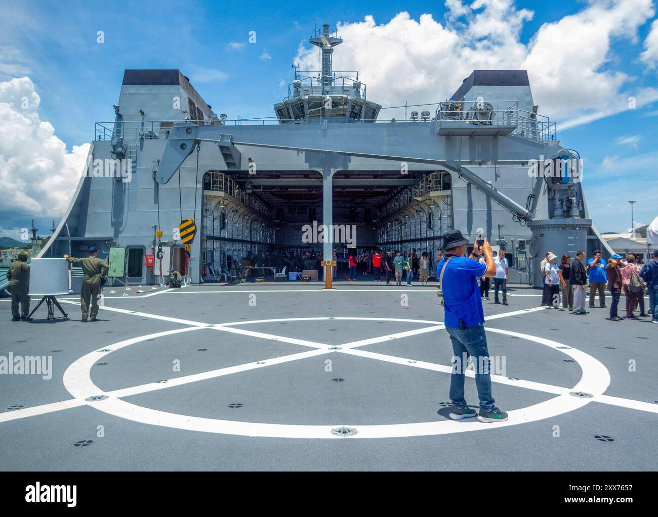 A visitor seen taking photos while touring HTMS Chang (LPD-792), the ...