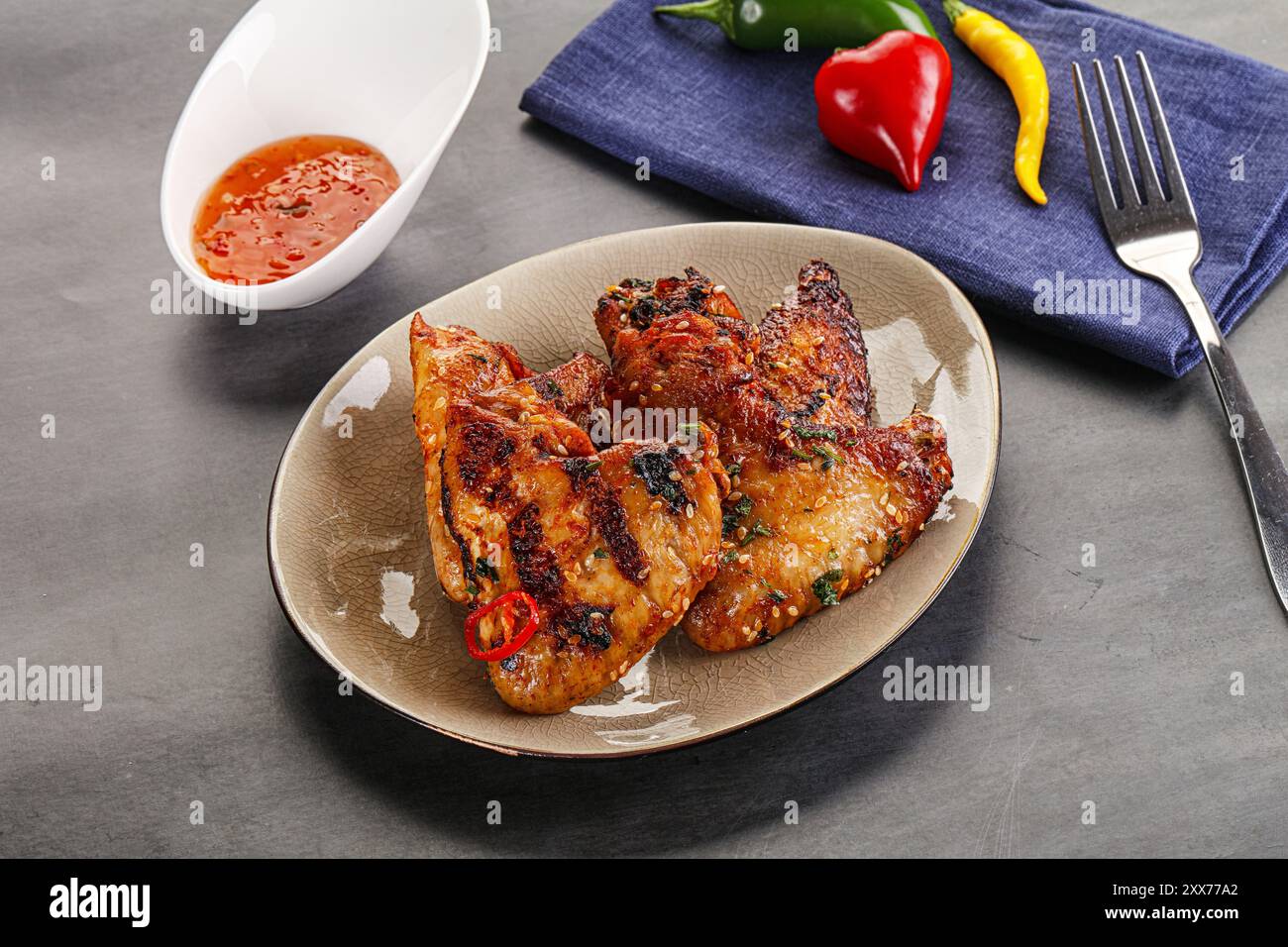 Buffalo grilled chicken wings barbecue with sauce Stock Photo - Alamy