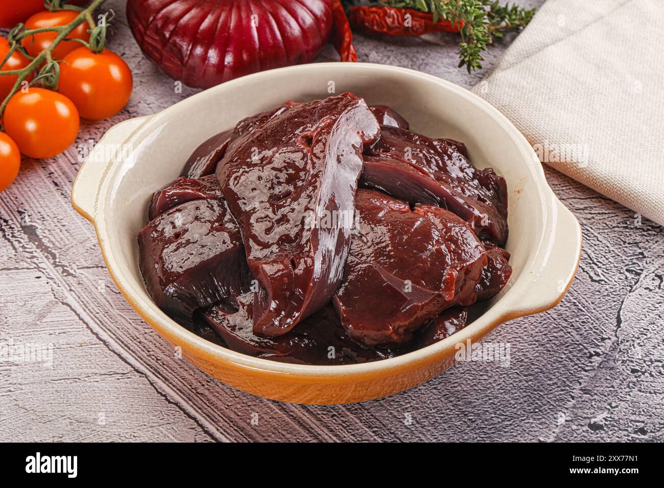 Raw dietary beef liver slices for cooking Stock Photo - Alamy