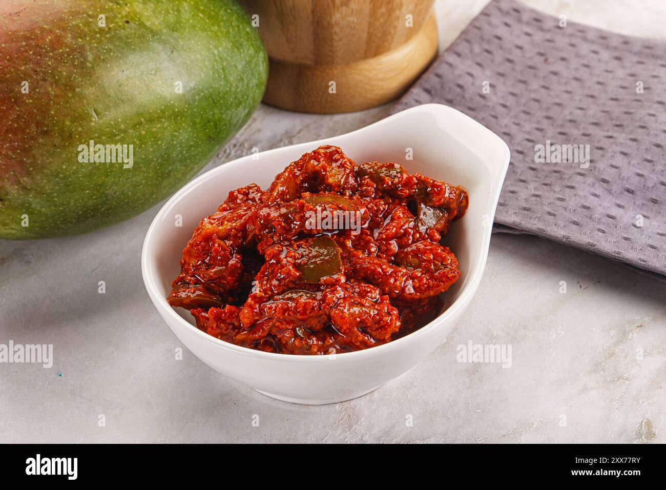Indian cuisine Spicy pickled raw green mango Stock Photo - Alamy