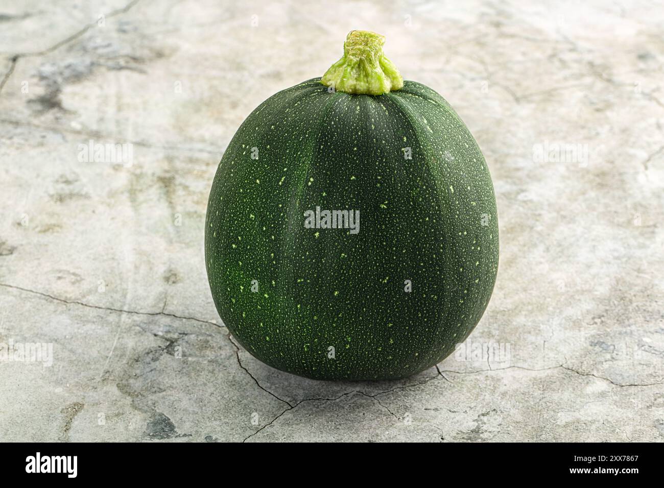 Raw green round zucchini vegetable for cooking Stock Photo - Alamy