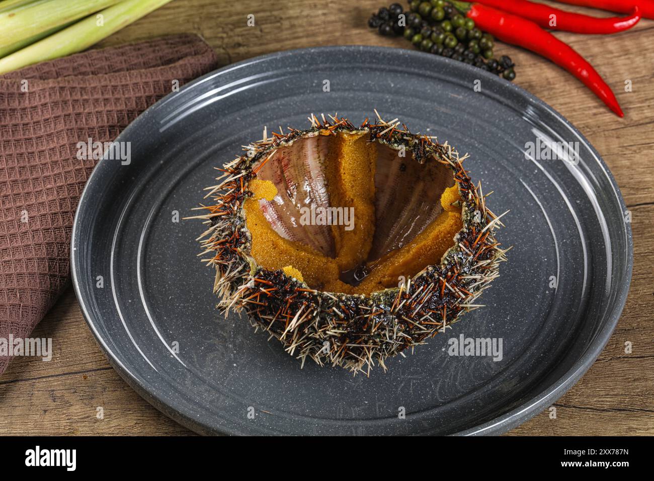 Delicous luxury raw sea urchin delicatessen Stock Photo - Alamy