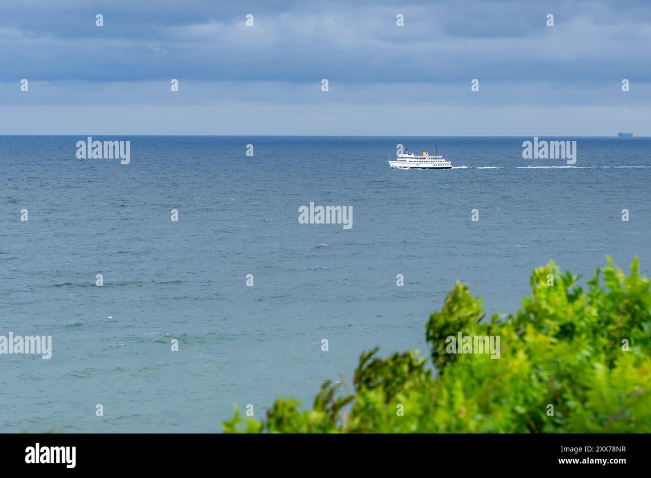 Photo of a distant traditional ferry from Clay Head Preserve, Block ...