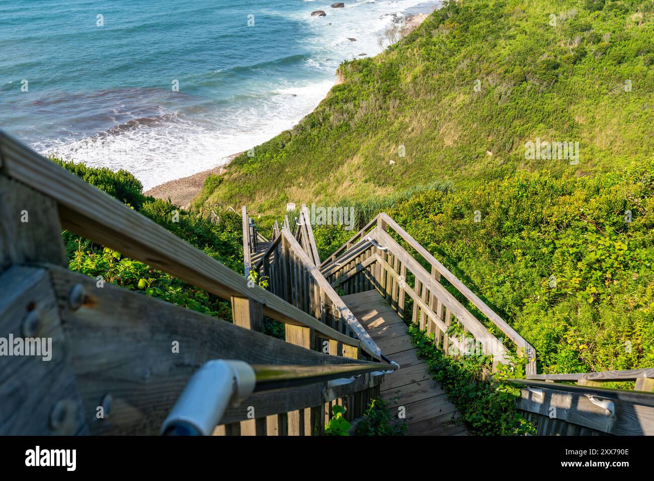 Wooden staircase leading down to the beach at Mohegan Bluffs, Block ...