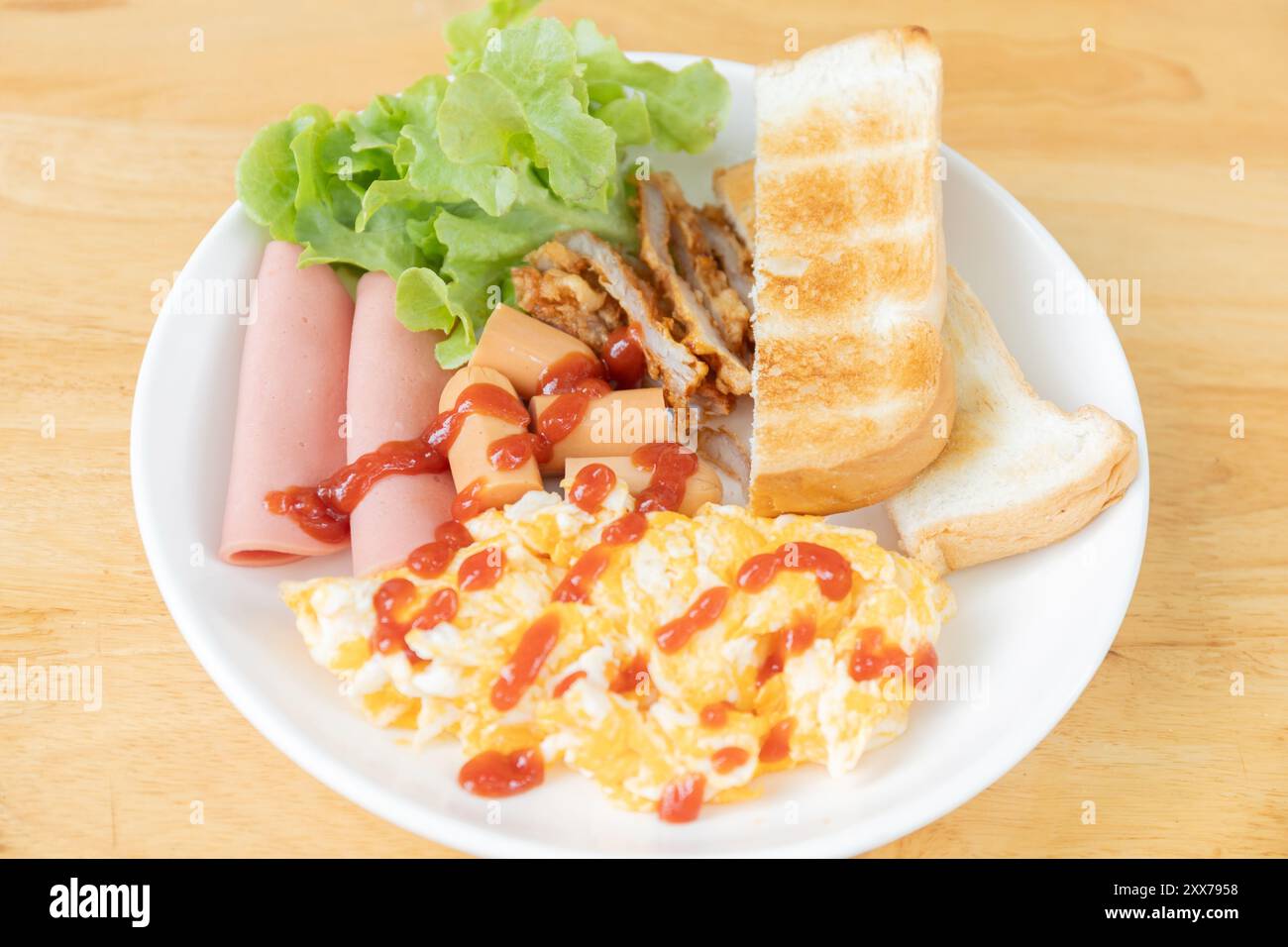 Classic Breakfast Plate: Egg, Ham, Toast, and Lettuce with a Delicious ...