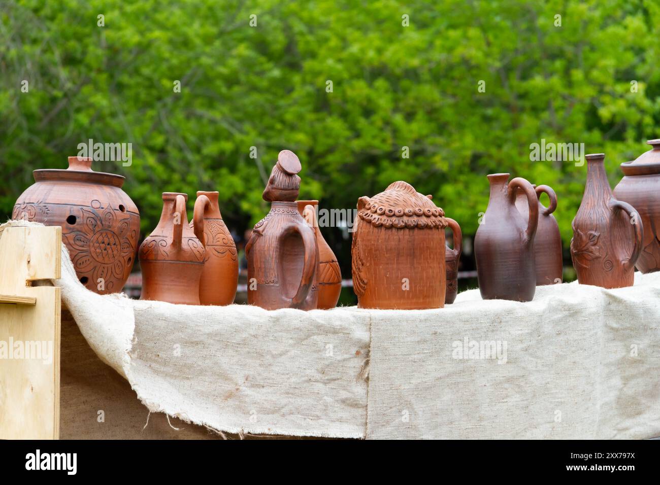 Exhibition of pottery. Pottery. Set of clay pots. The ancient art of ...