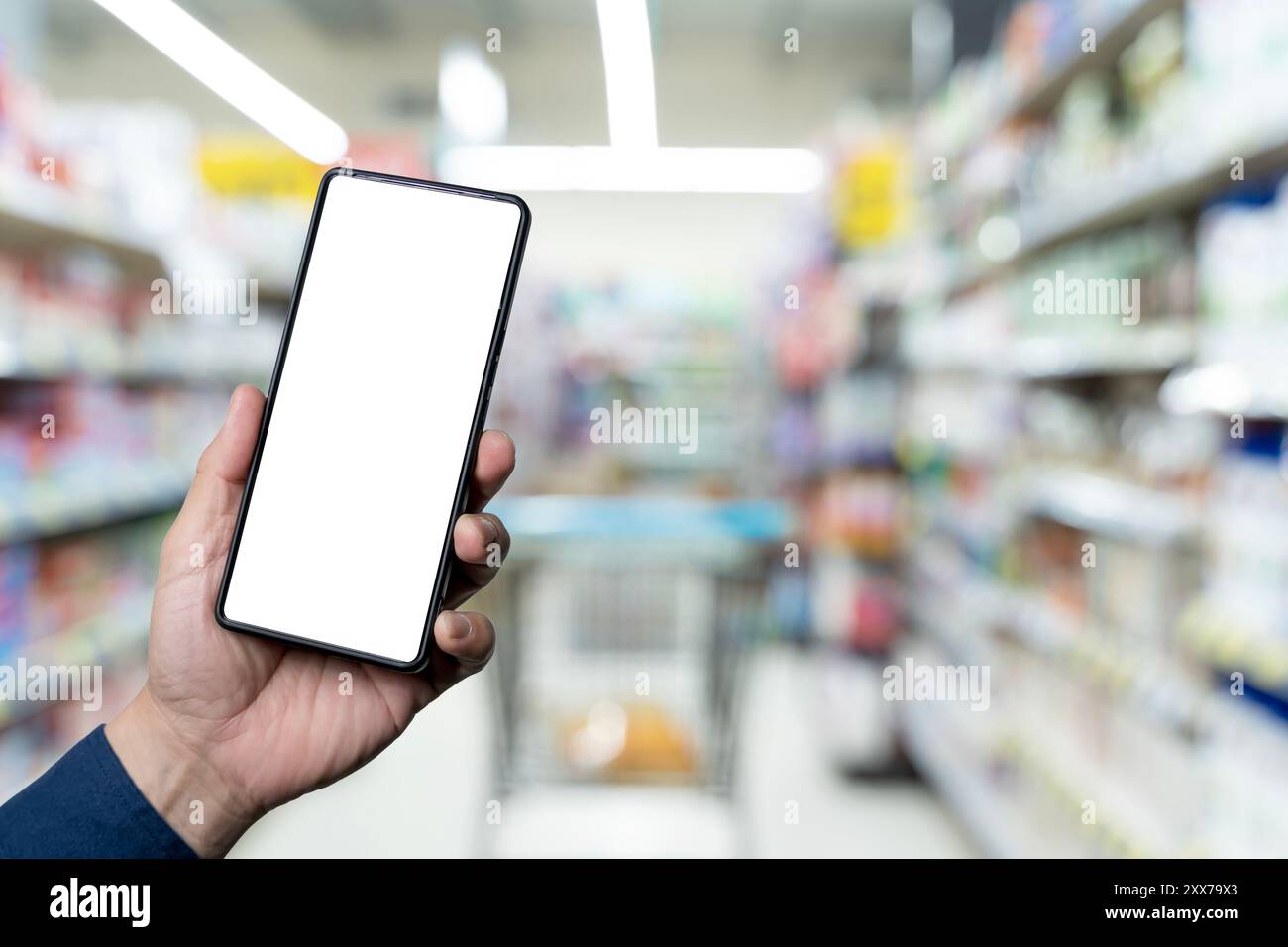 Personal perspective of a woman's hand holding up a smartphone while ...