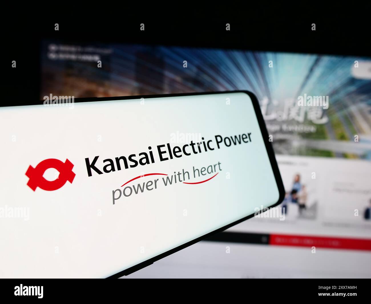 Smartphone with logo of Japanese company Kansai Electric Power Co. Inc ...