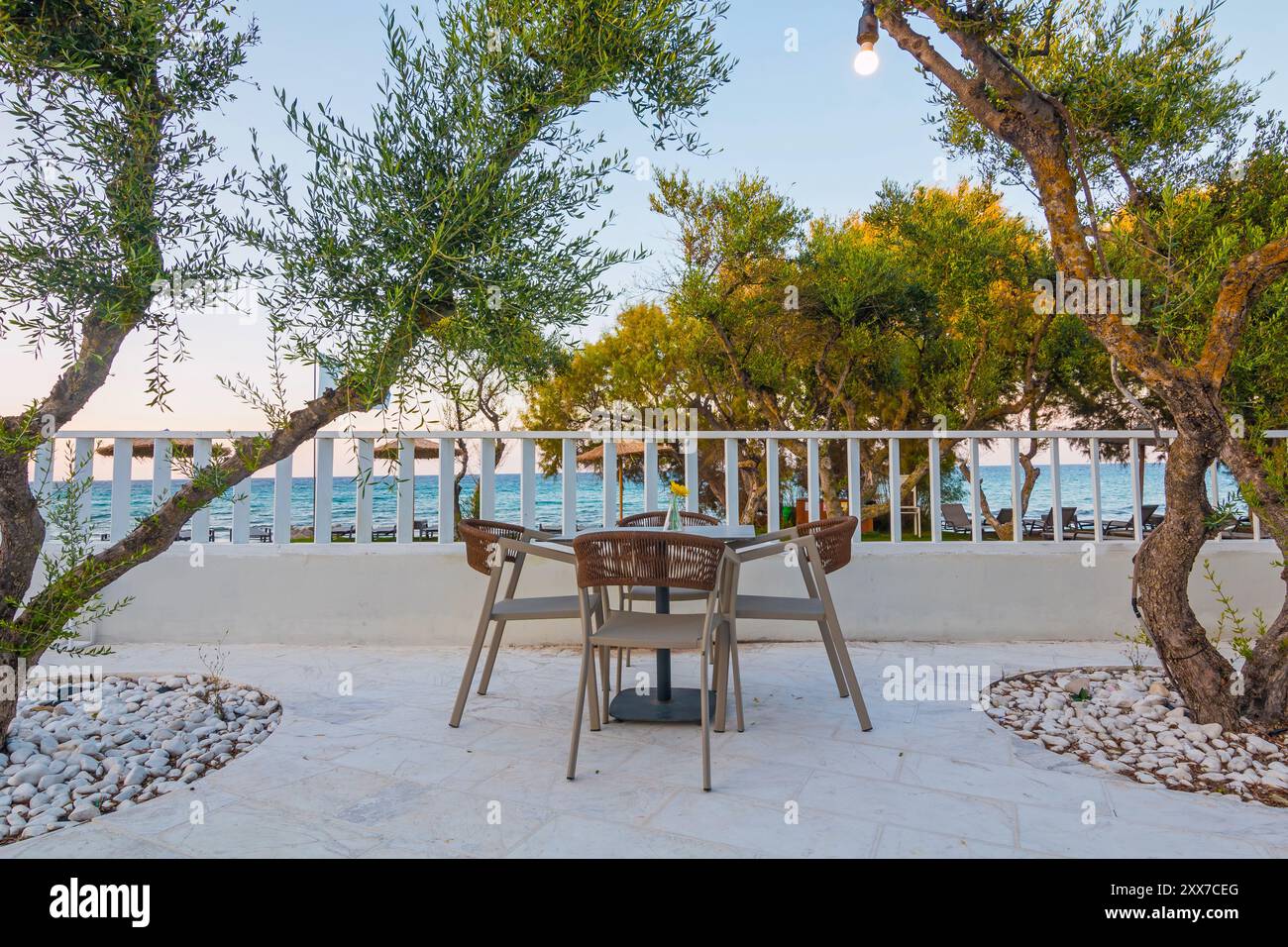 Tables in restaurant on the terrace . Zakynthos, Greece. Superb summer ...
