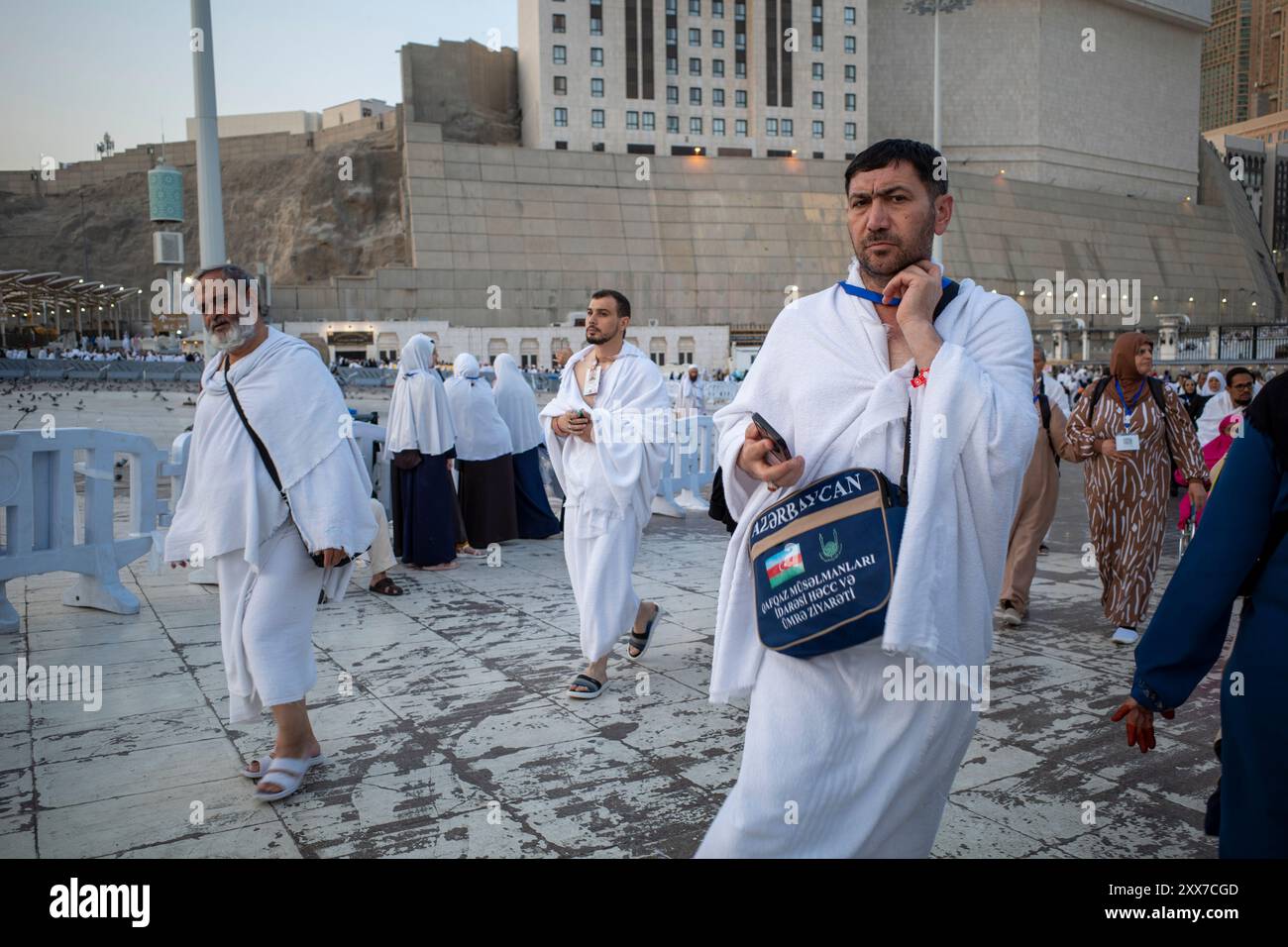 Mecca, Saudi Arabia - June 5, 2024: Hajj and Umrah pilgrim from Azerbaijan walking near Masjidil ...