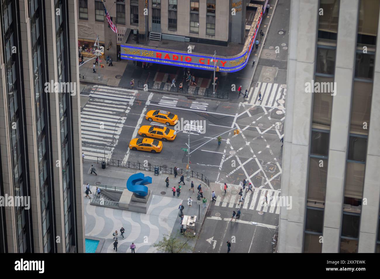 New York Yellow cabs on a zebra crossing next to Radio City Music Hall ...