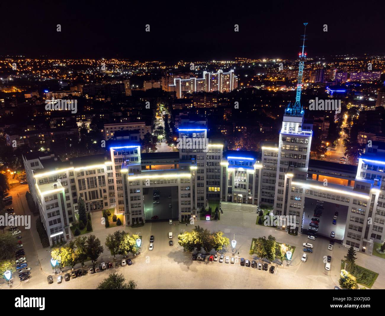 Aerial night Derzhprom landmark building with blue illumination and ...