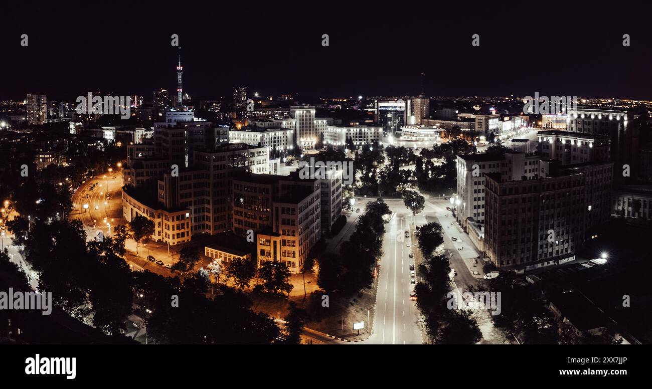 Aerial night illuminated Freedom Square panorama with Derzhprom and ...