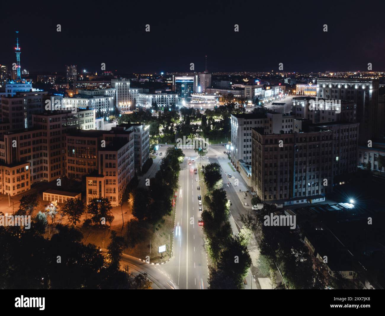 Aerial night illuminated Freedom Square with Derzhprom and Karazin ...
