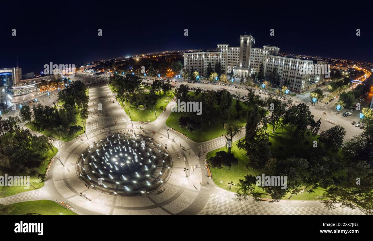 Aerial night Freedom Square wide panorama with fountain and illuminated ...
